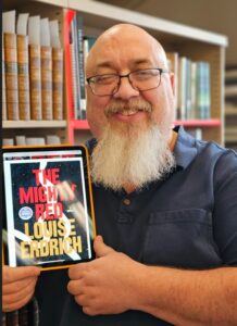 Book Review: The Mighty Red - Community Library